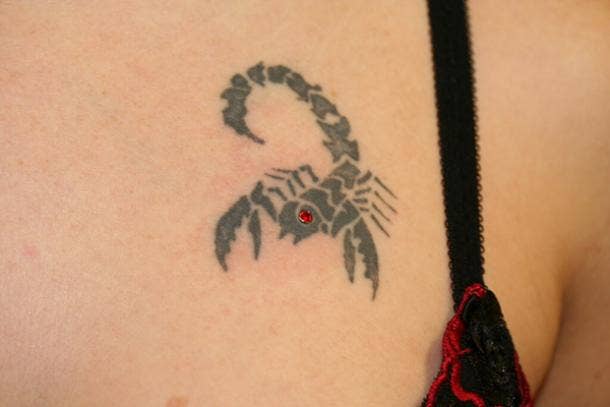29 Tattoo Design Ideas With Dermal Piercings To Add Glam To Your Ink Yourtango